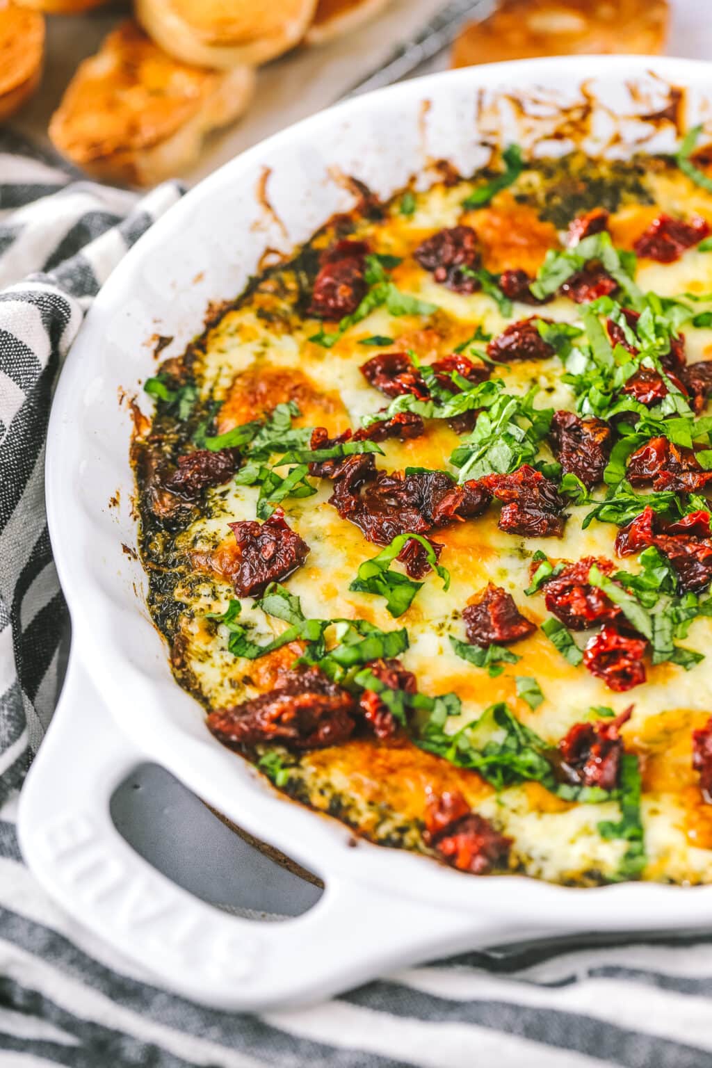 Easy Cheesy Baked Pesto and Sun-Dried Tomato Dip - Cooking in my Genes