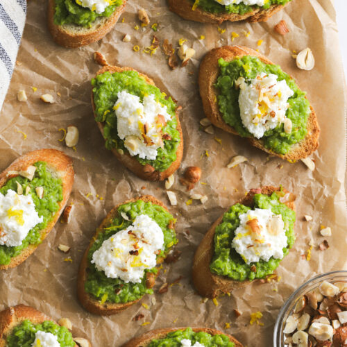 Easy Spring Pea Crostini with Ricotta & Hazelnuts - Cooking in my Genes