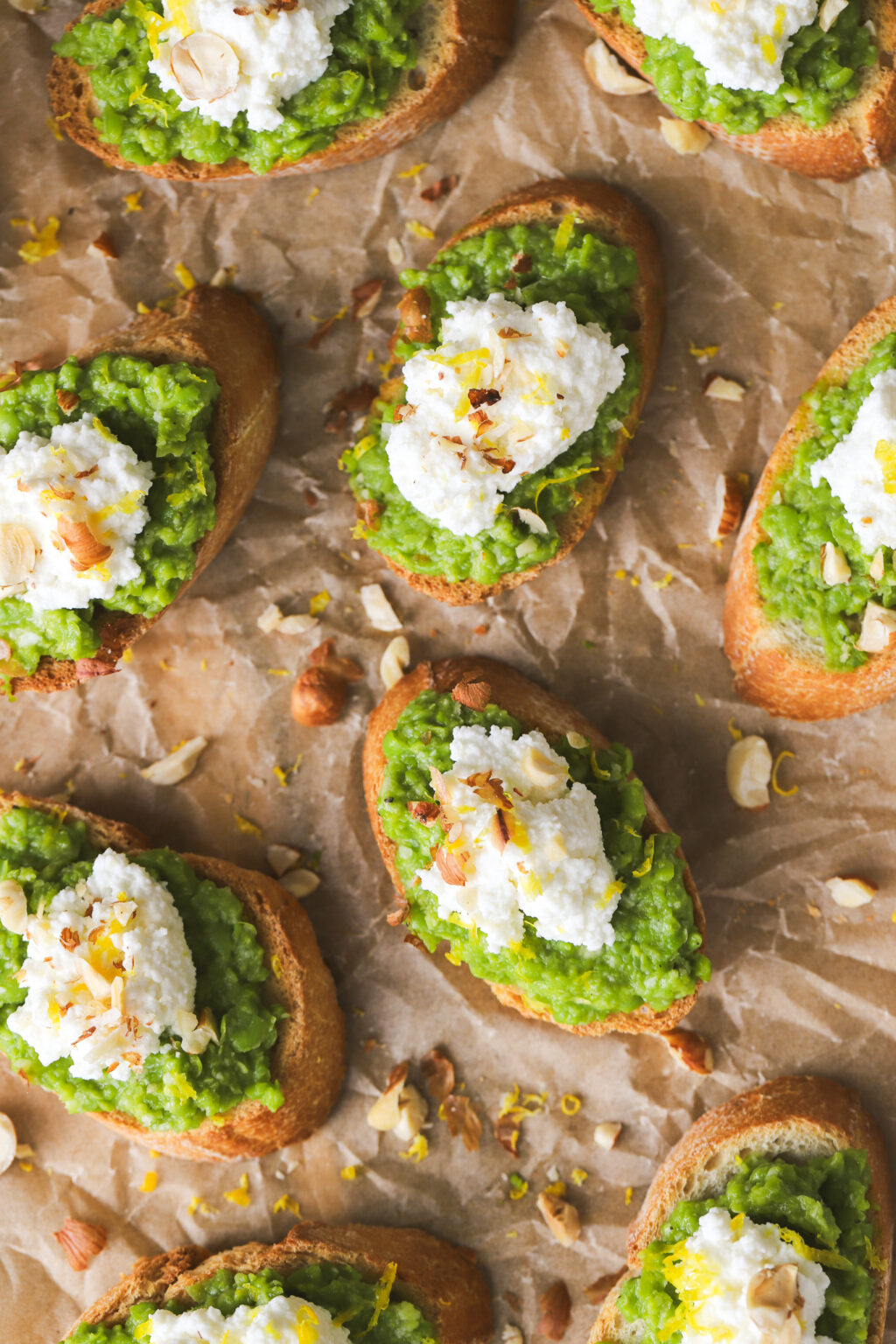 Easy Spring Pea Crostini with Ricotta & Hazelnuts - Cooking in my Genes